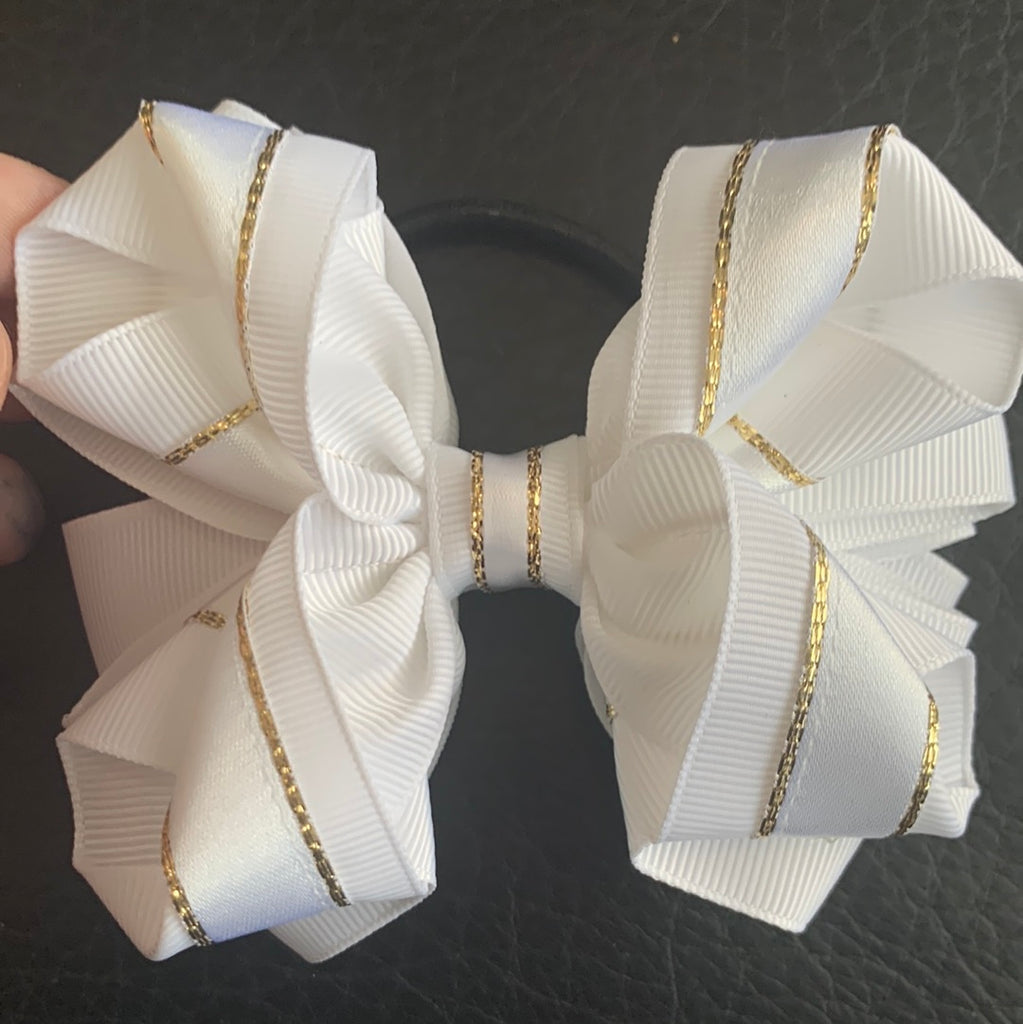 Luxury Bows: White and gold twist bows | Showponyprep.com